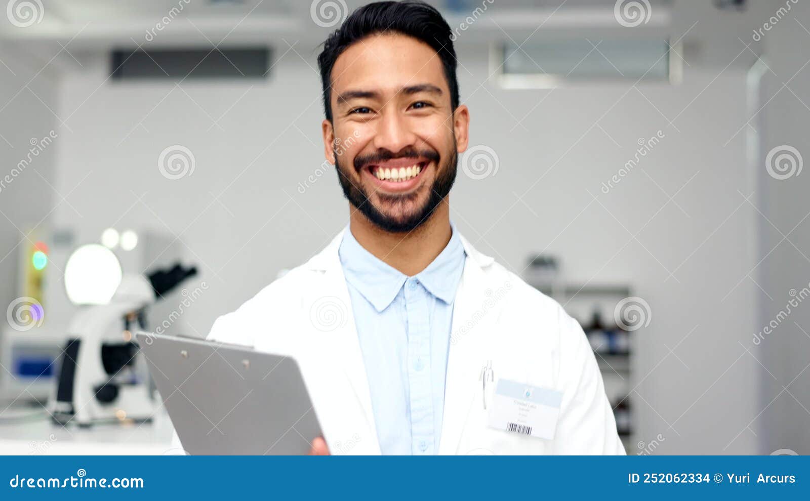 Portrait of a Scientist Working in a Lab. Young Pathologist and ...