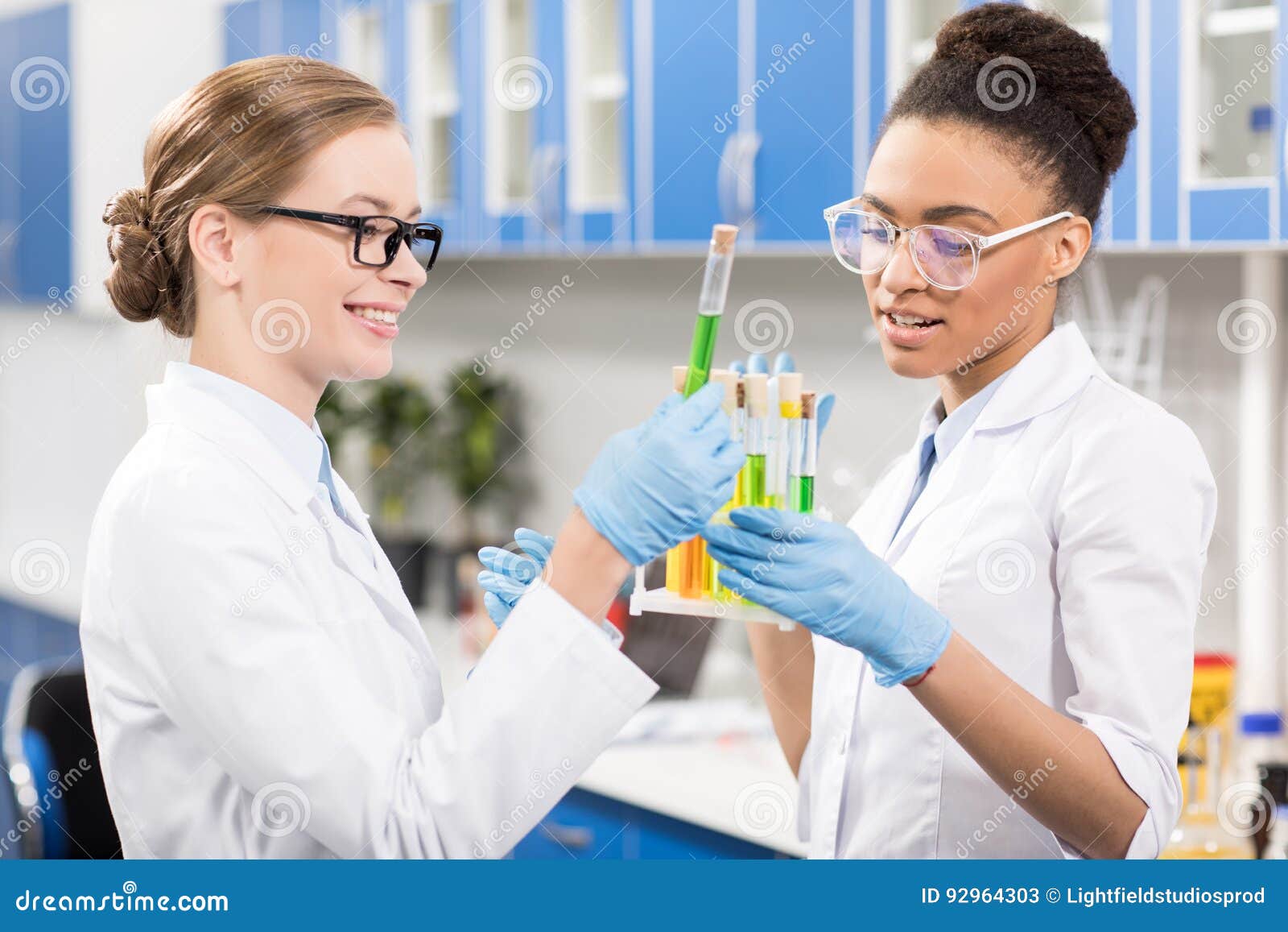 Portrait of Scientists Working with Test Tubes Stock Image - Image of ...