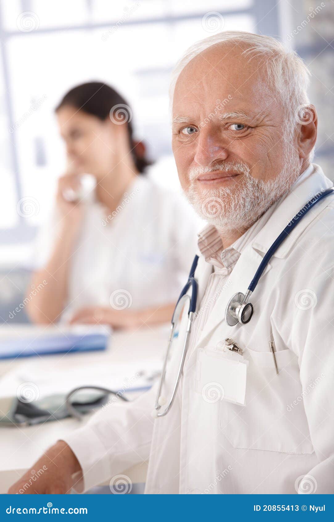 Portrait of Senior Doctor Smiling Stock Image - Image of clinician ...