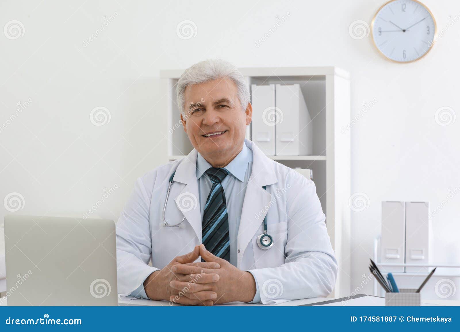 Portrait Of Senior Doctor In Coat At Workplace Stock Image Image Of