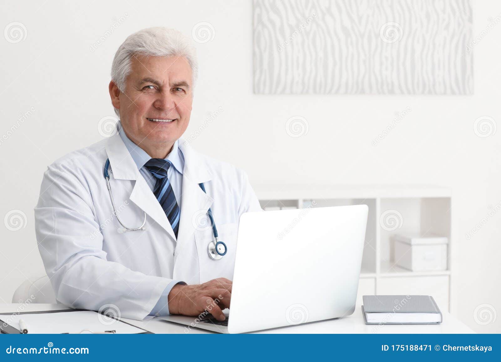 Portrait Of Senior Doctor In Coat At Workplace Stock Image Image Of
