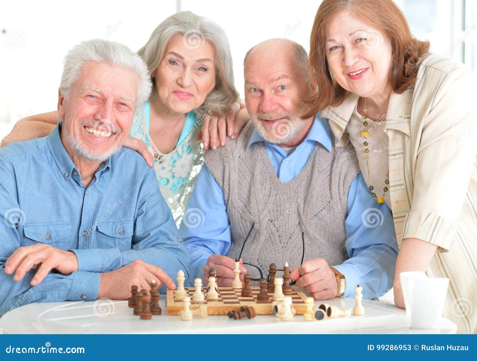 Senior men playing chess stock image. Image of retirement - 99286953