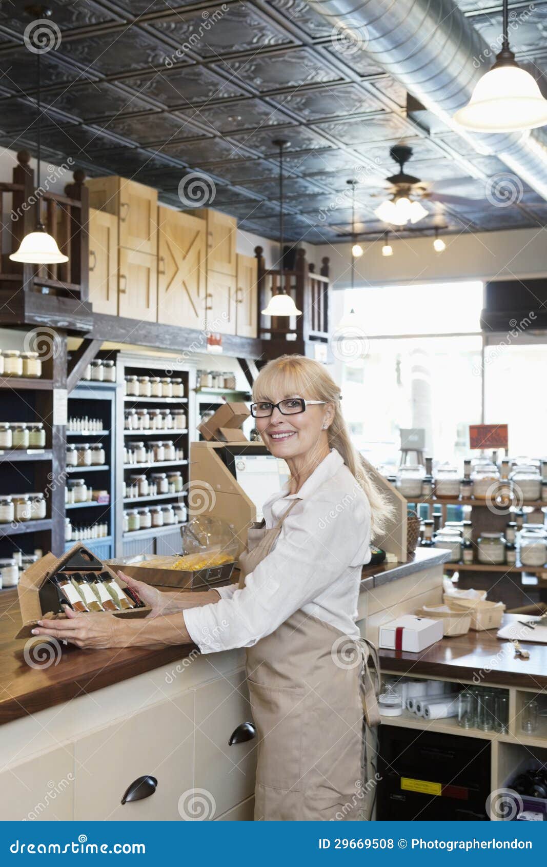 Portrait of a Senior Spice Merchant Standing at Counter in Store Stock ...