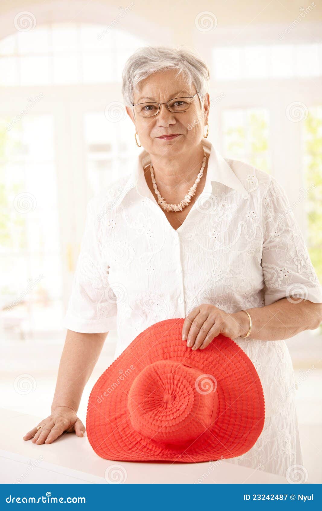 Portrait of Senior Woman Holding Hat Stock Image - Image of american ...