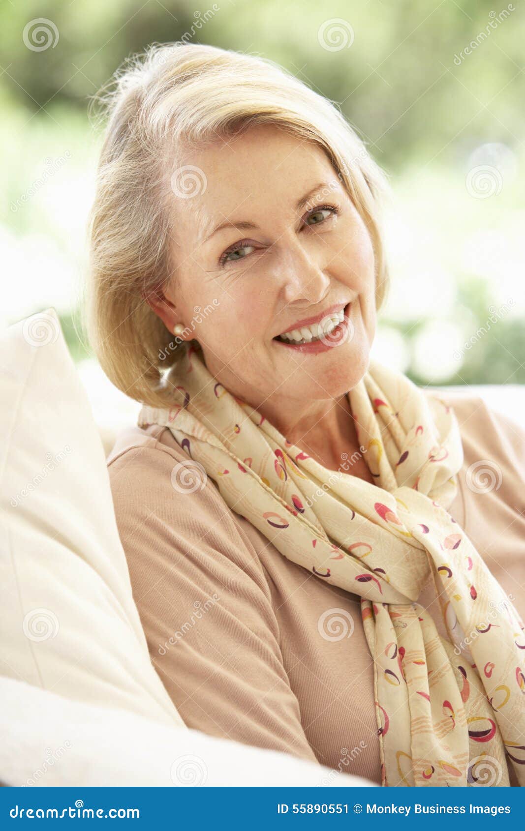 Portrait of Senior Woman Relaxing on Sofa Stock Image - Image of person ...
