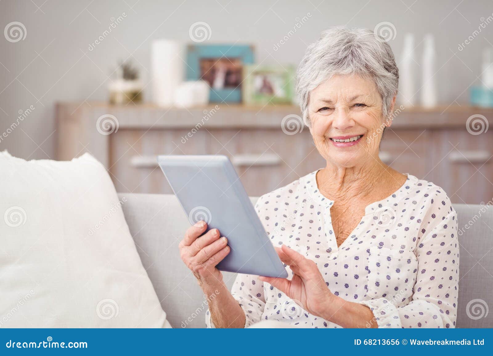 Portrait of Senior Woman Using Digital Tablet Stock Photo - Image of ...