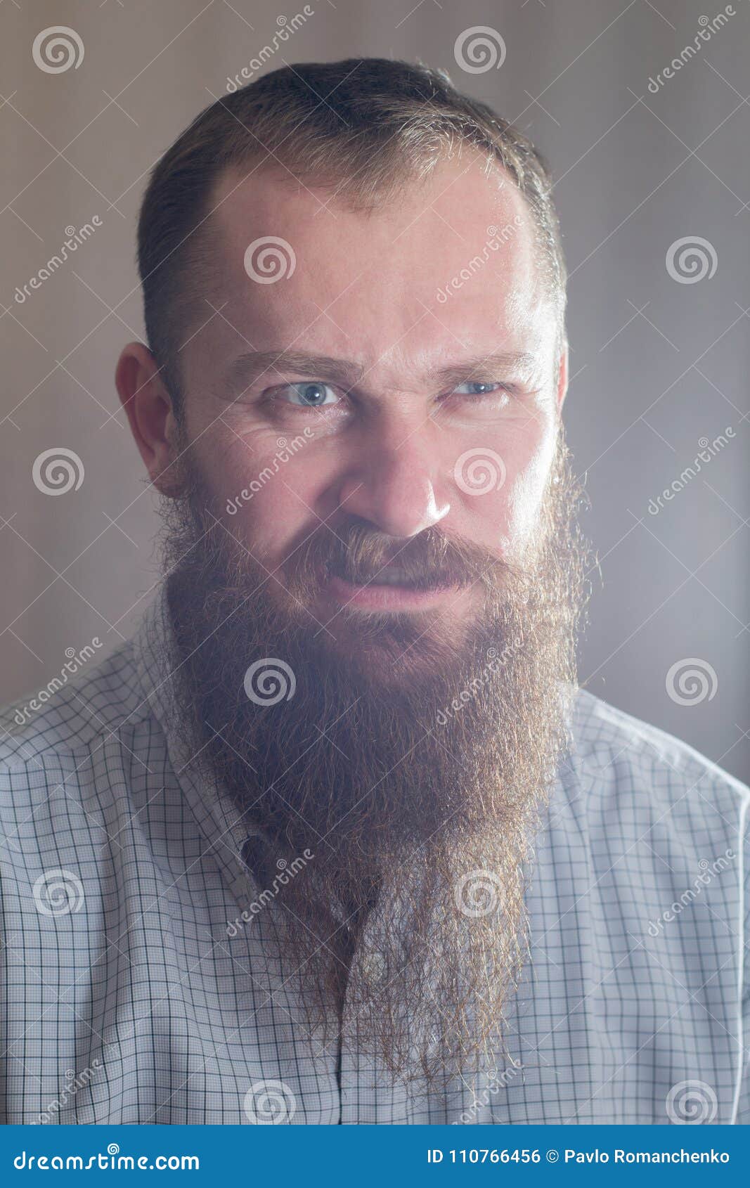 Portrait of a Serious Angry Man with a Long Beard Stock Photo - Image ...