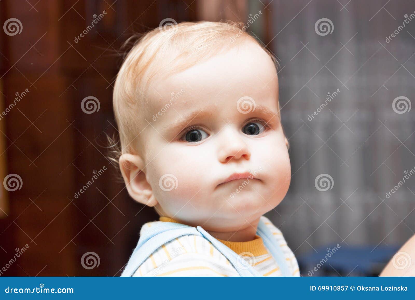 Portrait of a serious baby stock image. Image of infant - 69910857