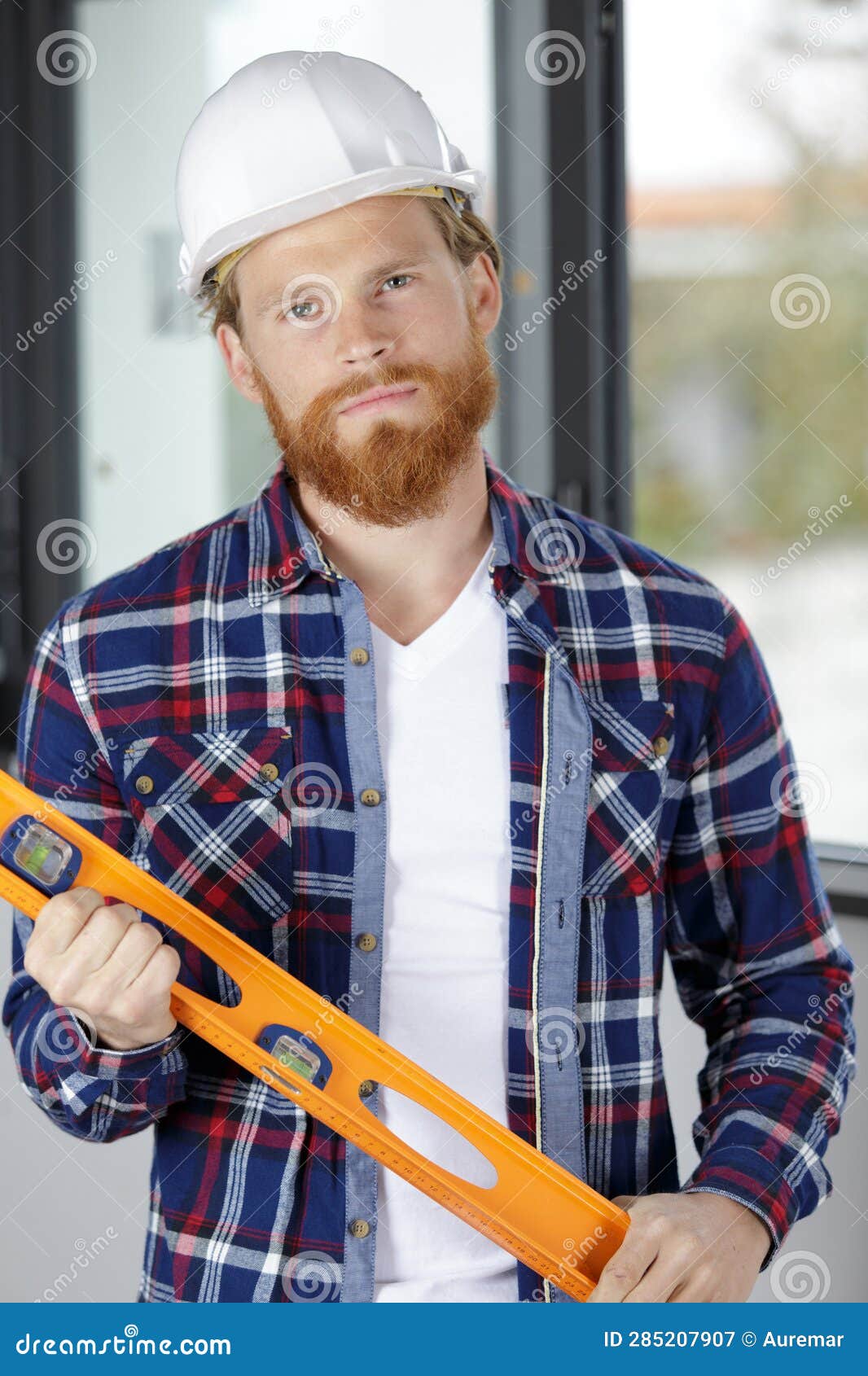 Portrait Serious Builder Holding Spirit Level Stock Image - Image of ...