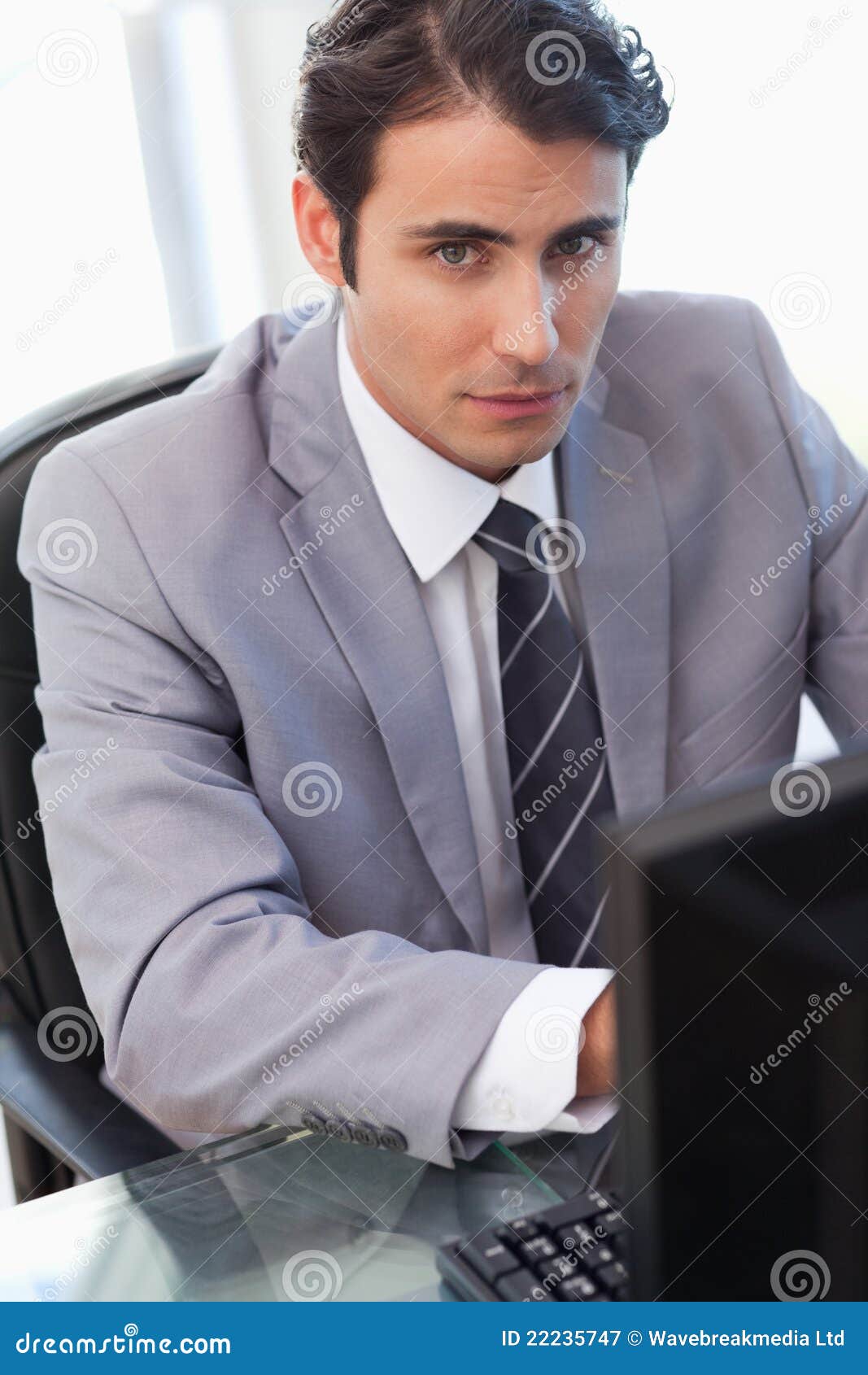 Portrait of a Serious Businessman Working with a Computer Stock Image ...