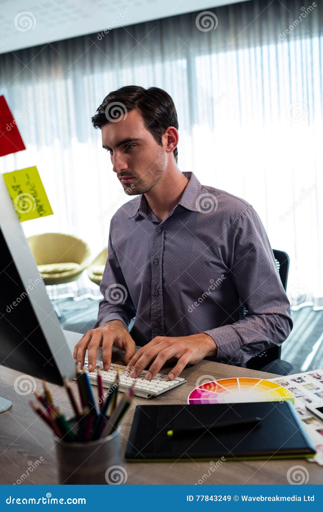 Portrait of Serious Casual Man Working at Computer Desk Stock Image ...