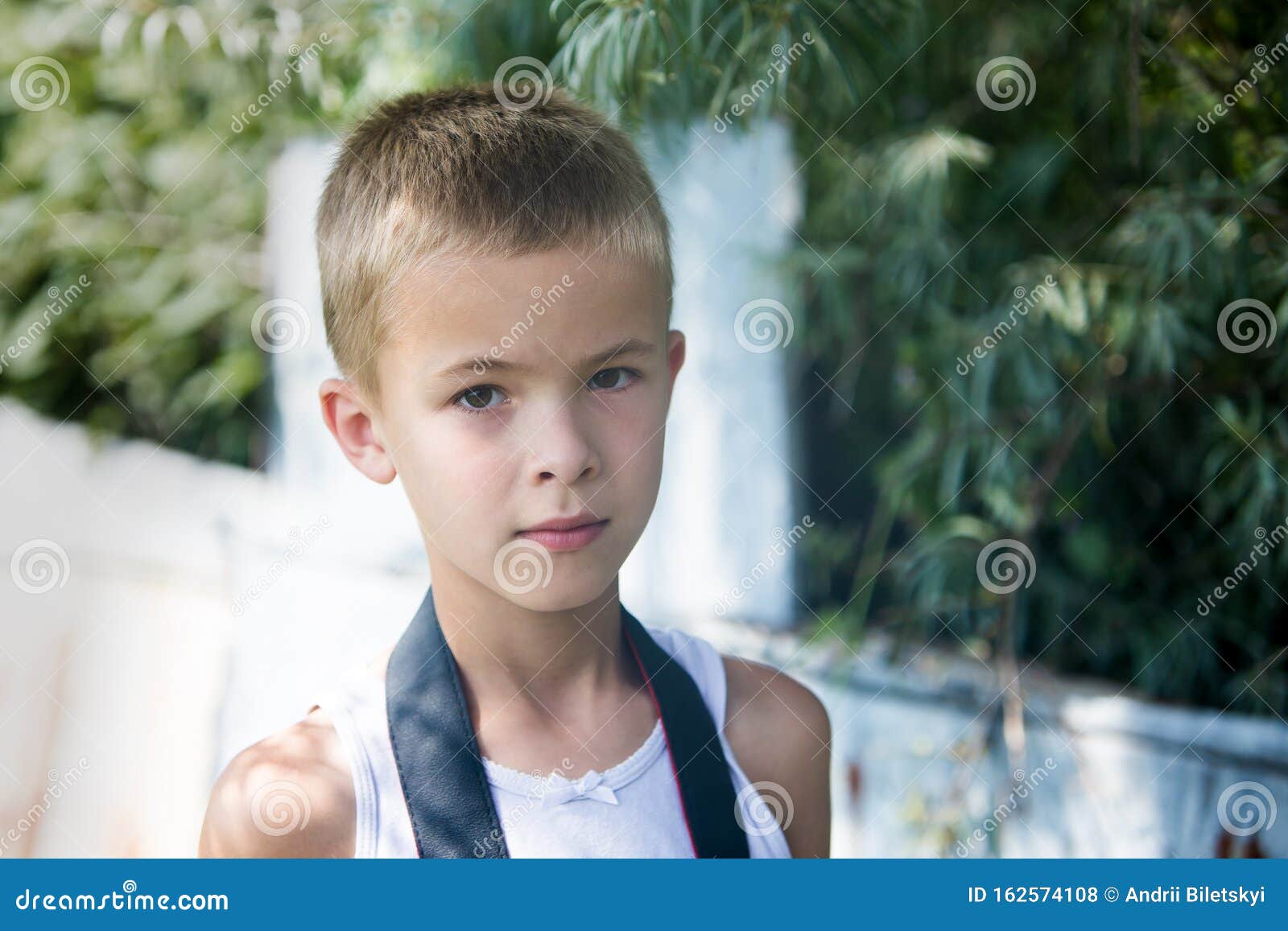 Portrait of a Serious Child Boy Outdoors Stock Photo - Image of little ...