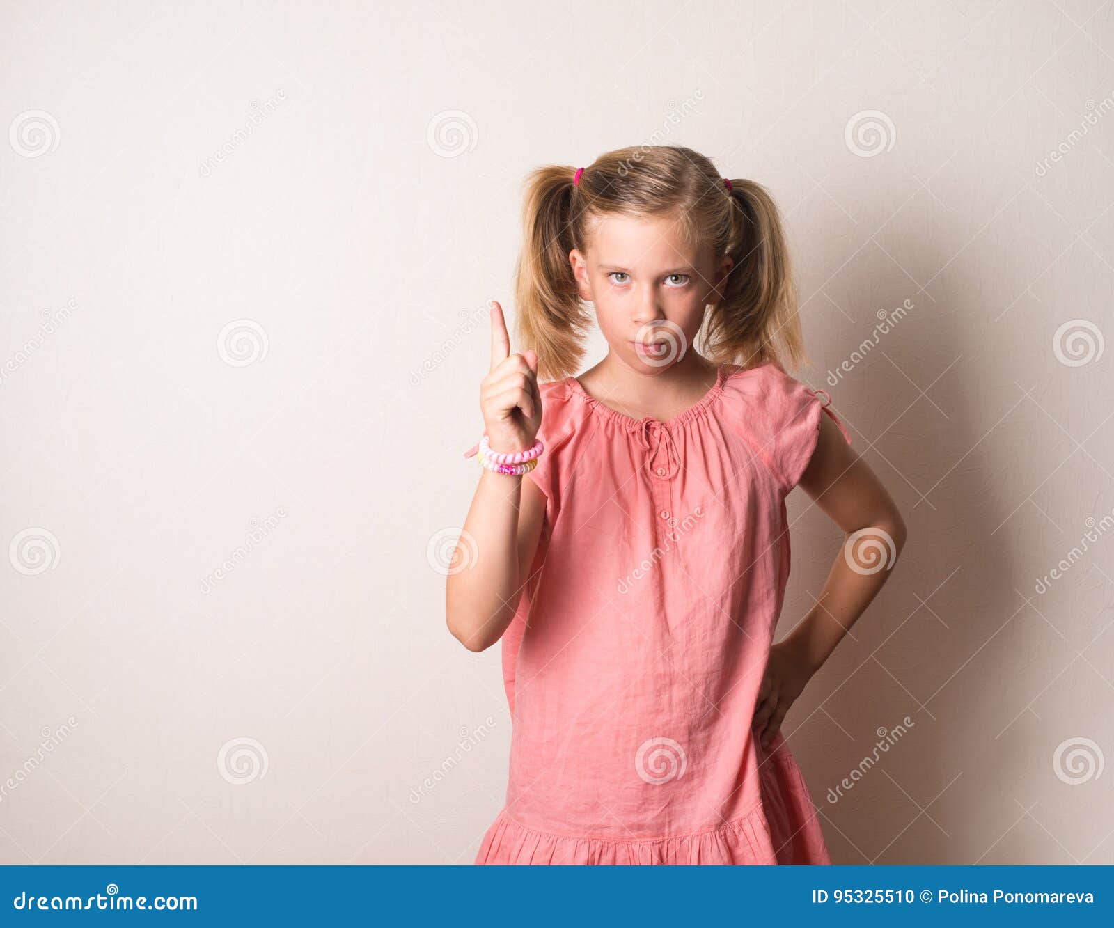 Portrait of Serious, Frowning, Angry, Grumpy Girl Pointing Finger ... Portrait of Serious, Frowning, Angry, Grumpy Girl Pointing Finger ...