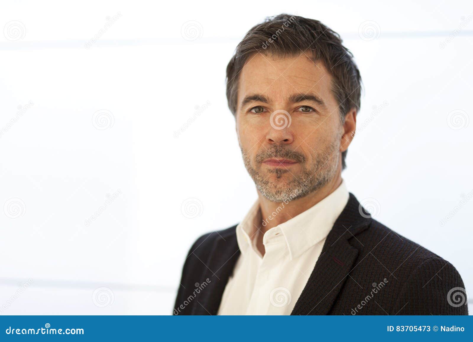 Portrait of a Serious Handsome Man Isolated on White Stock Image ...
