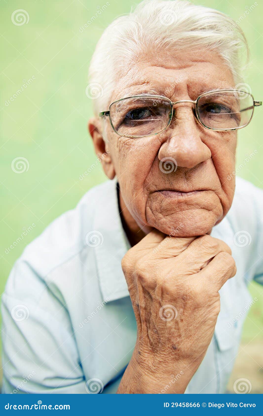Portrait of Serious Old Man Looking at Camera with Hands on Chin Stock ...