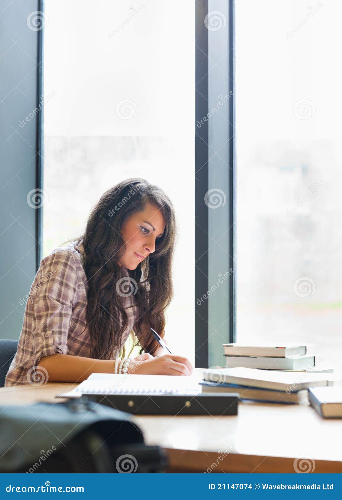 Portrait of a Serious Student Writing Stock Photo - Image of searching ...