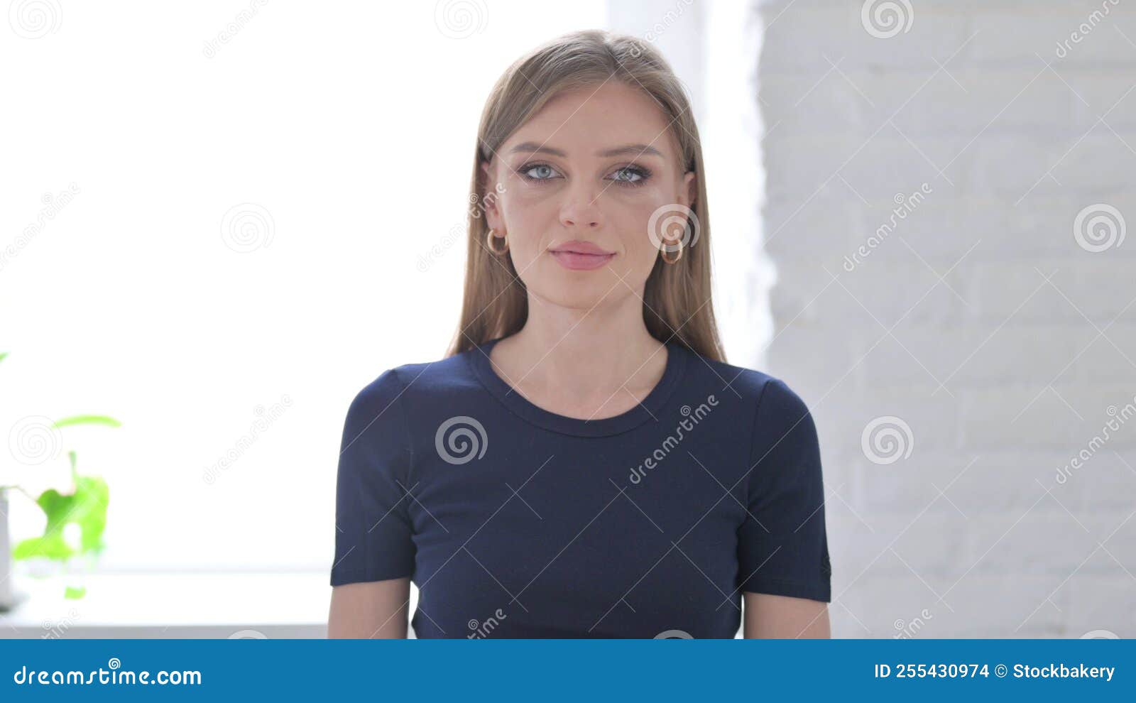 Portrait of Serious Woman Looking at the Camera Stock Photo - Image of ...