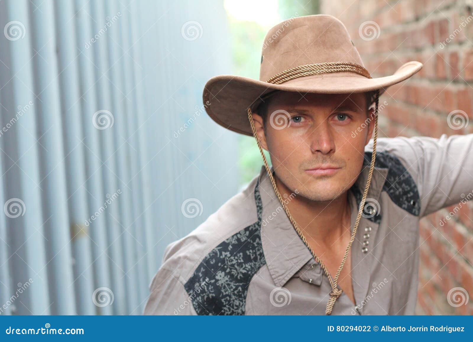 Portrait of Serious Young Attractive Cowboy Stock Photo - Image of ...