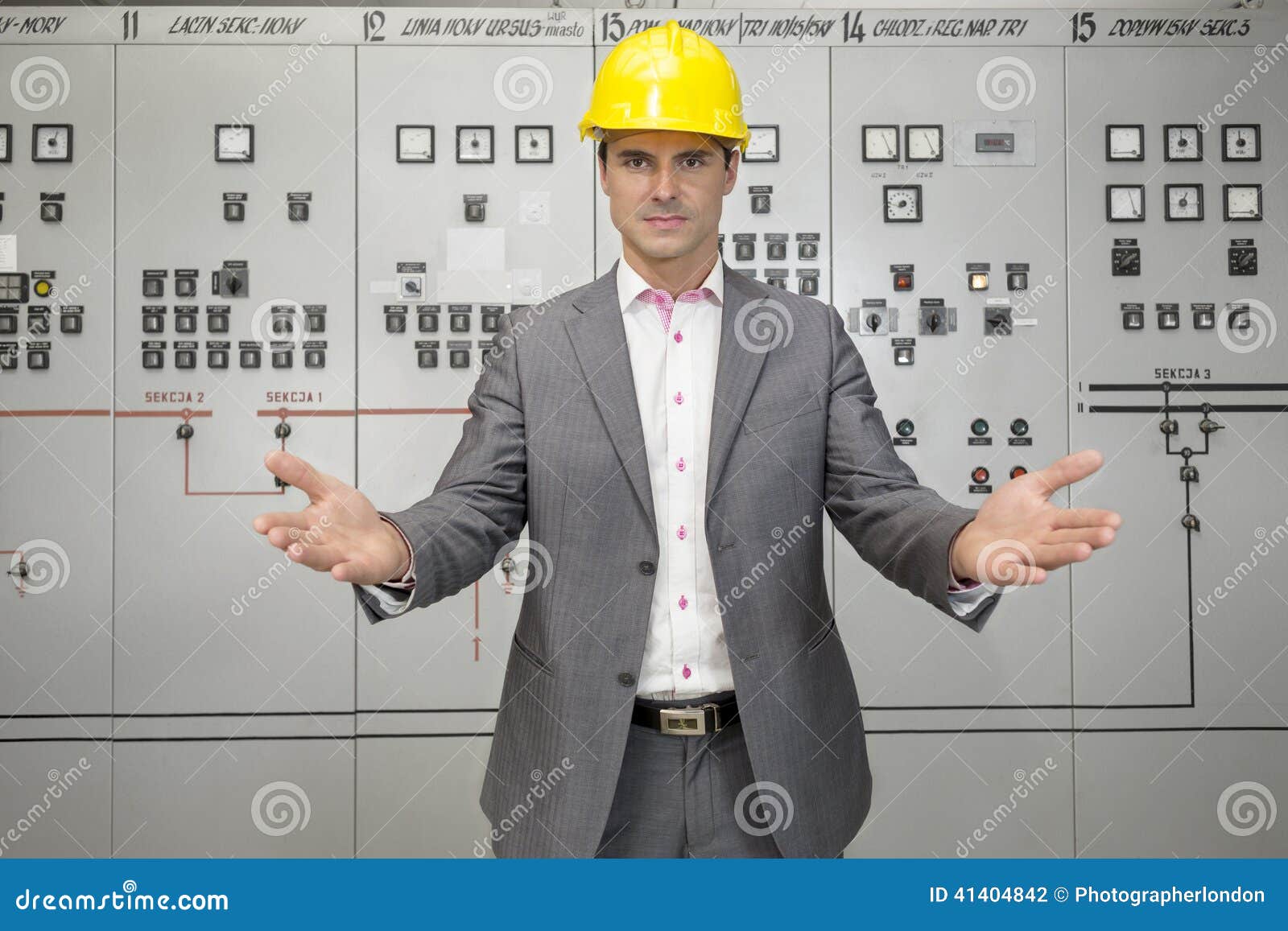 Portrait of Serious Young Male Supervisor Gesturing in Control Room ...