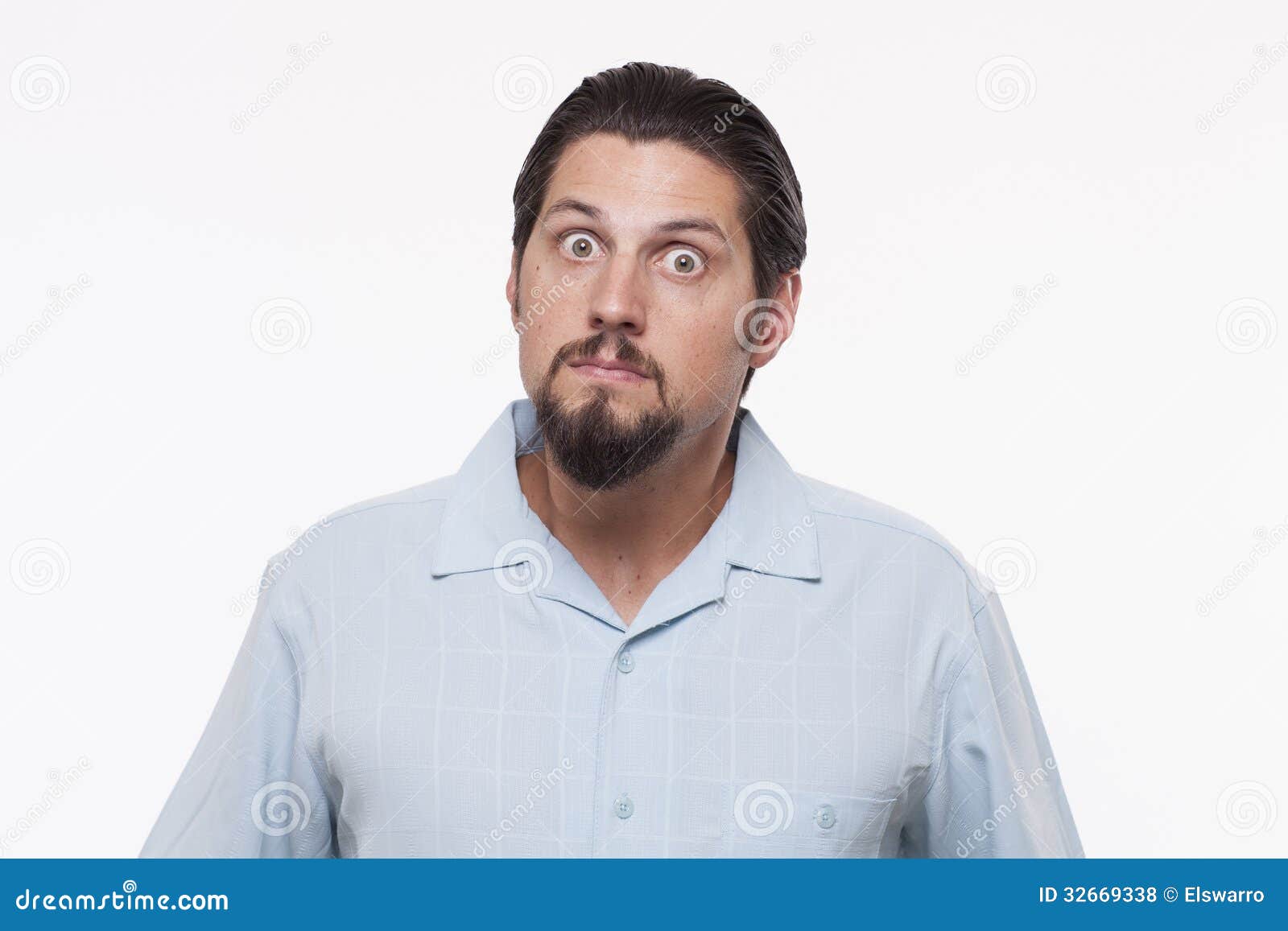 Portrait of a Serious Young Man Posing Against White Stock Photo ...