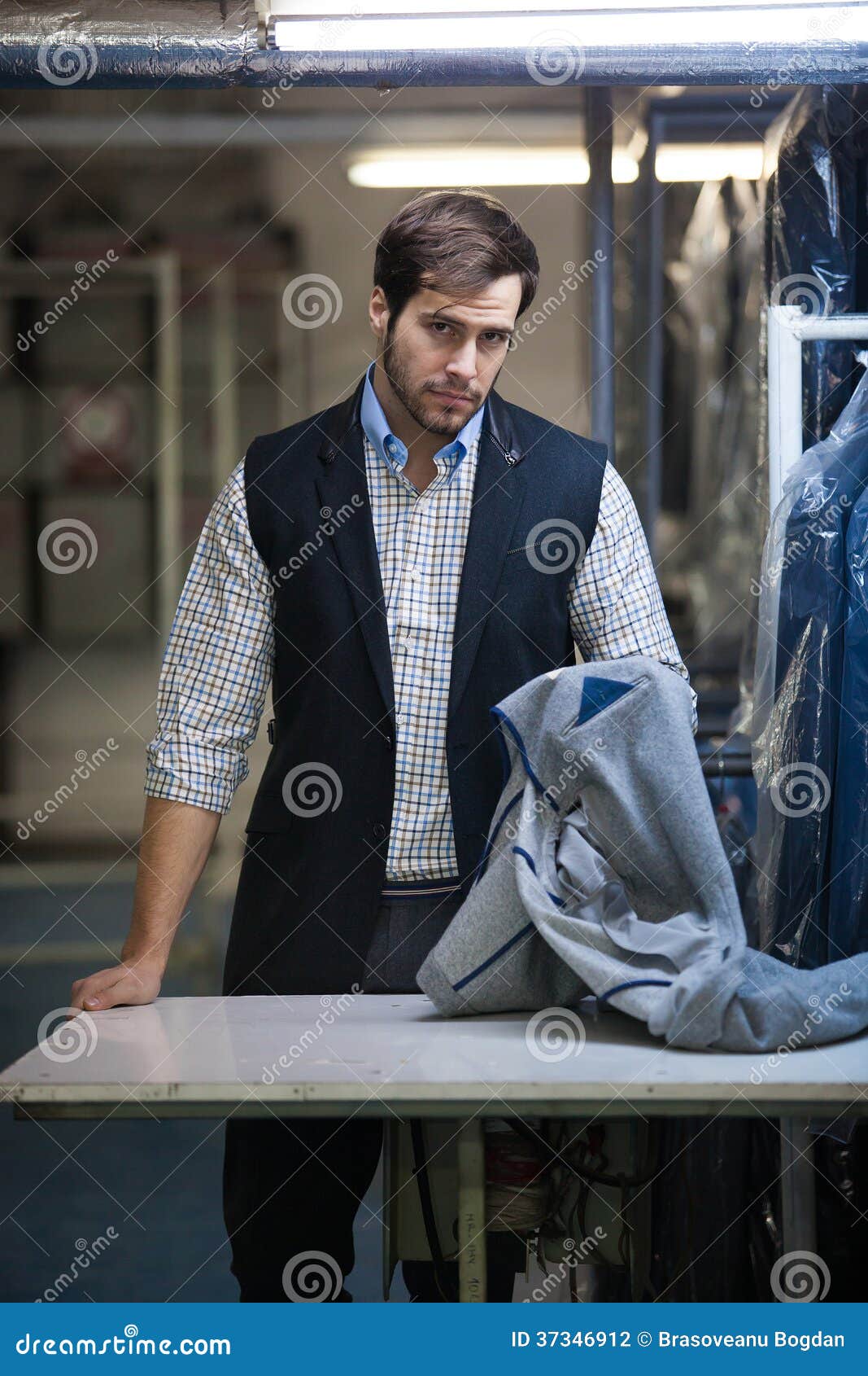 Portrait of a Serious Young Tailor Man at the Store Stock Photo - Image ...