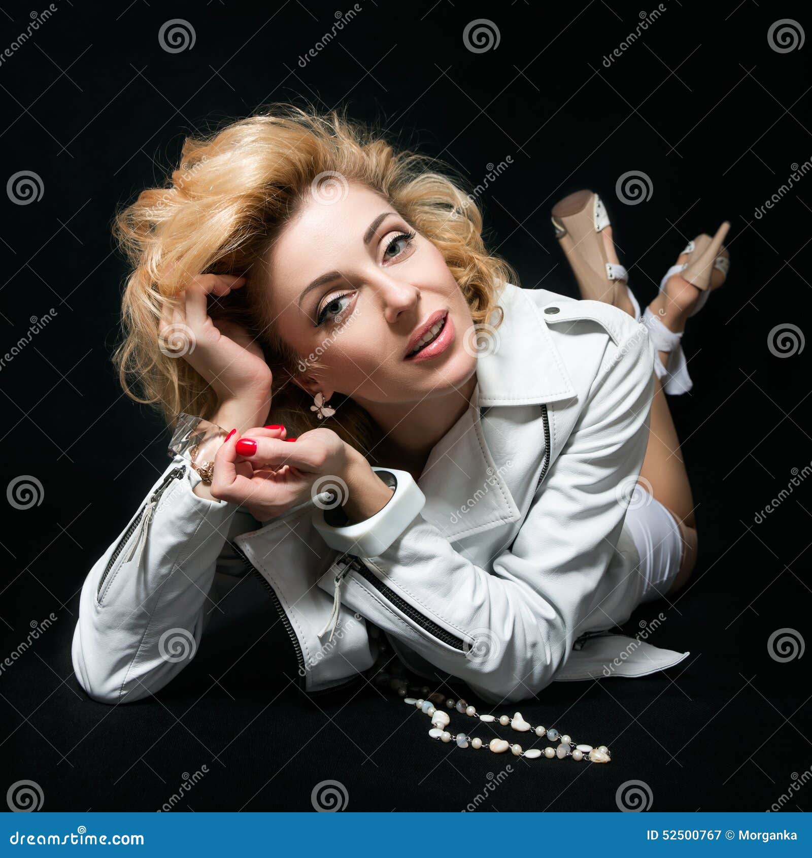 Portrait Of Sexual Adult Blond Woman Wearing White Dress And Lea Stock