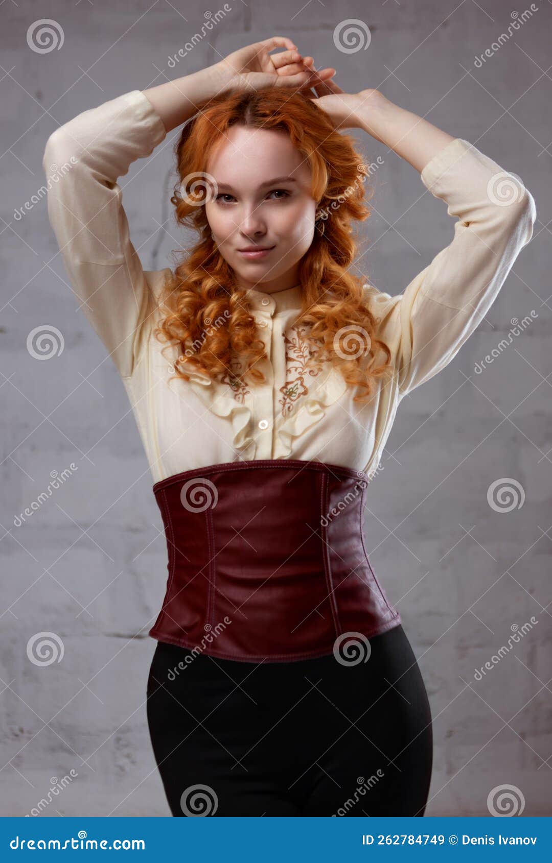Portrait Of A Red Haired Woman In A Skirt Blouse And Corset Stock