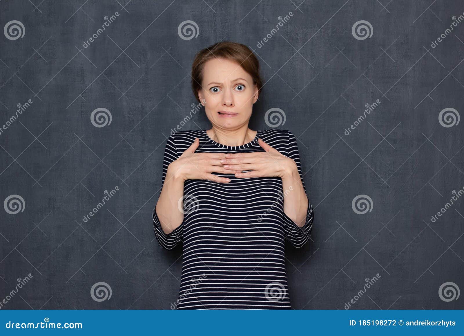 Portrait Of Shocked Young Woman Seeing Something Disgusting Or Awful