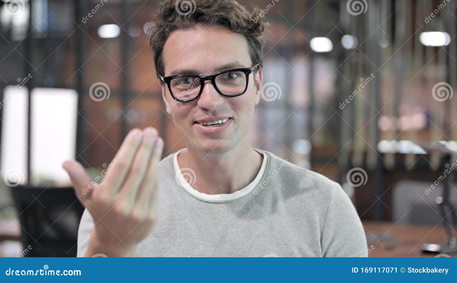 Portrait Shoot of Young Guy Inviting by Hand Sign Stock Image - Image ...
