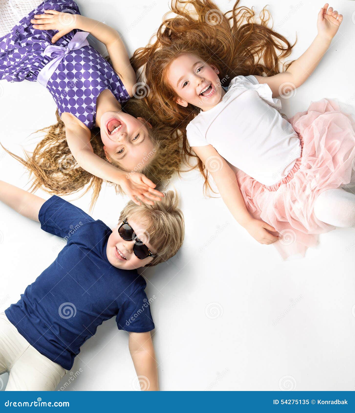 Portrait of Siblings Lying on a White Background Stock Image - Image of ...