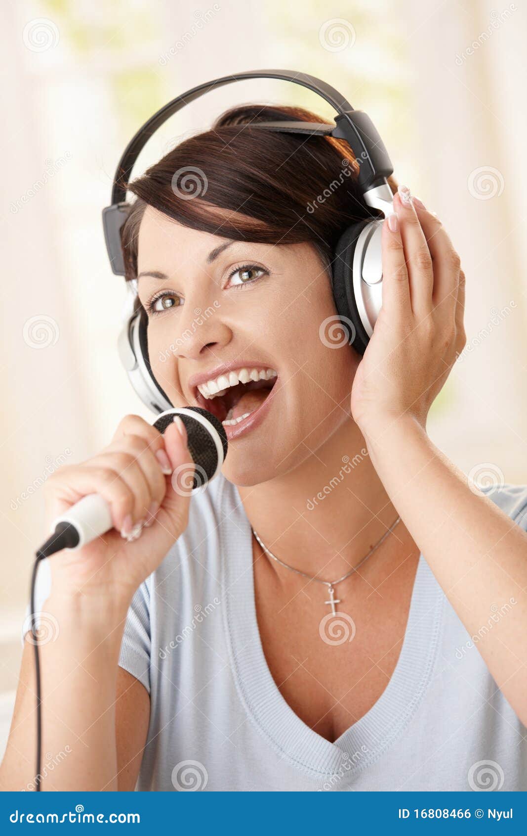 Portrait of singing woman stock photo. Image of entertainment - 16808466
