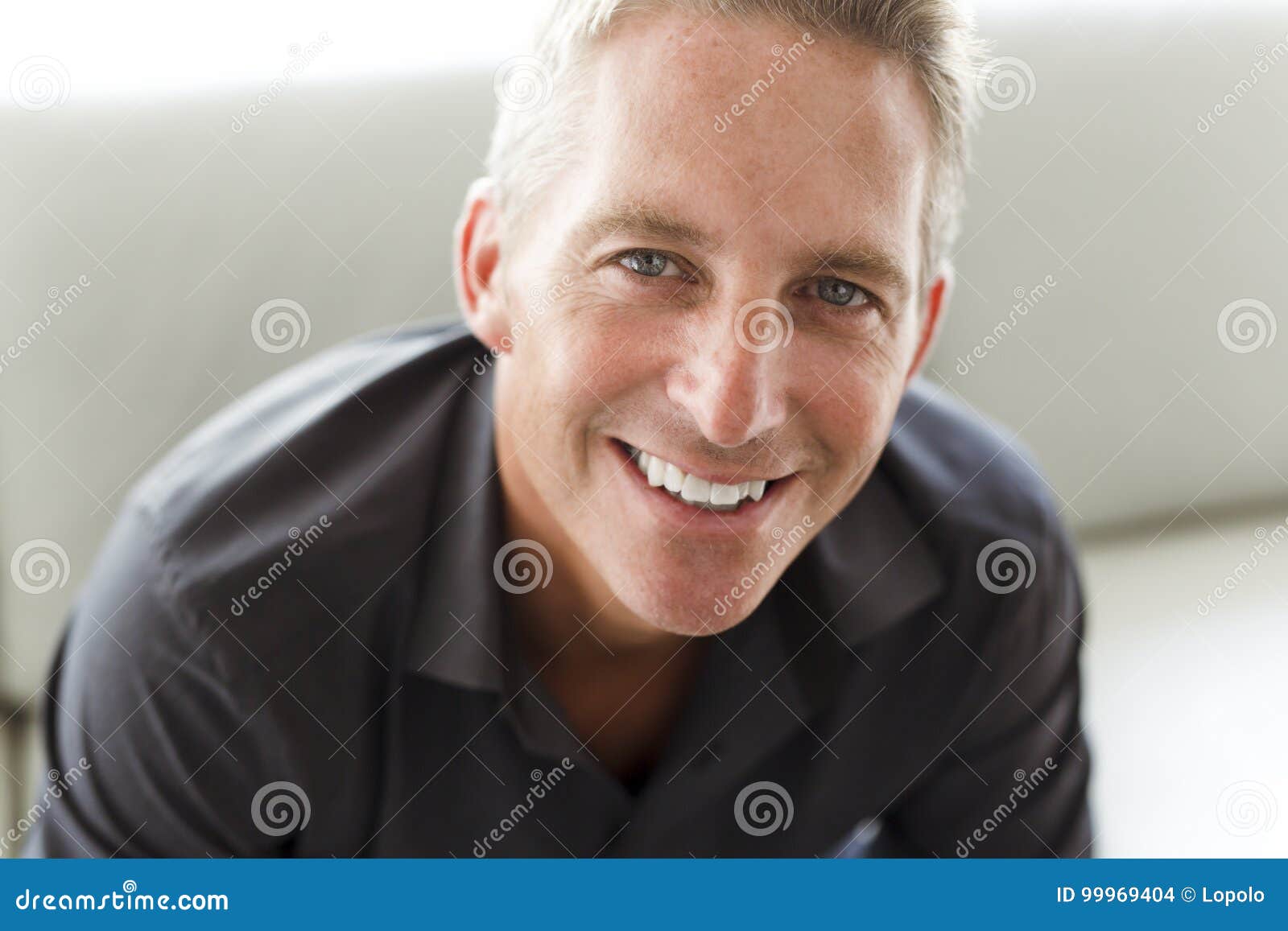 Portrait of Single 40s Man Sitting in Sofa Stock Photo - Image of couch ...
