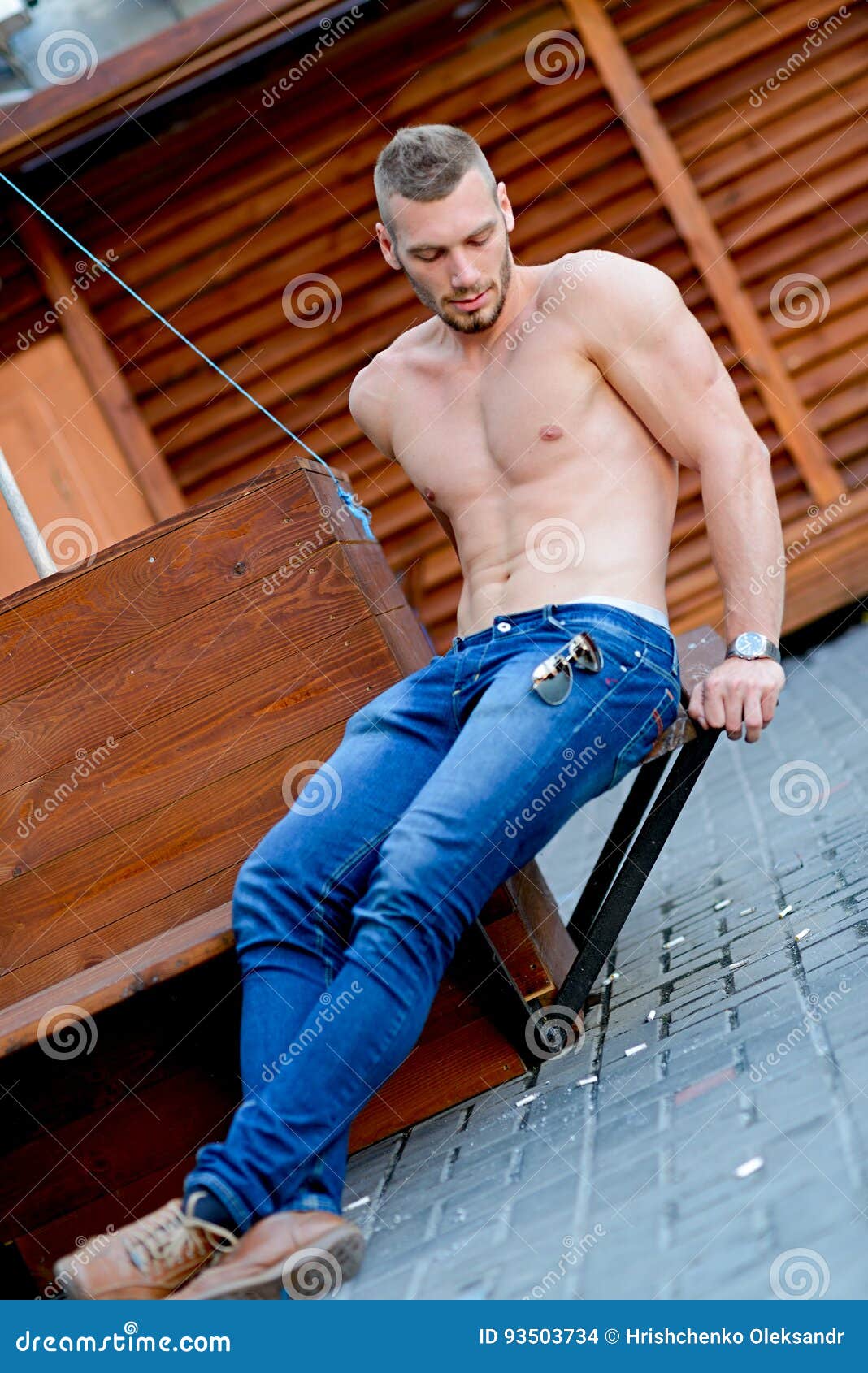 Portrait of a Sitting Athletic White Man in Jeans Stock Photo - Image ...