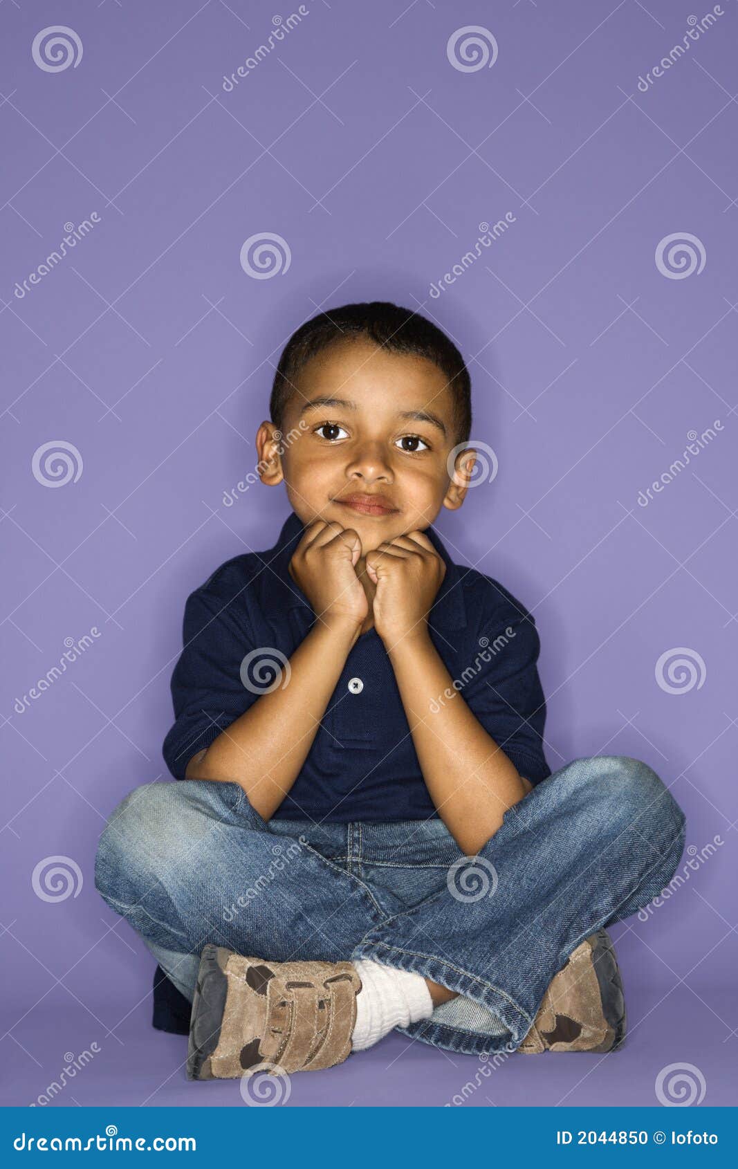 Portrait of a Sitting Boy.. Stock Photo - Image of photograph, hands ...
