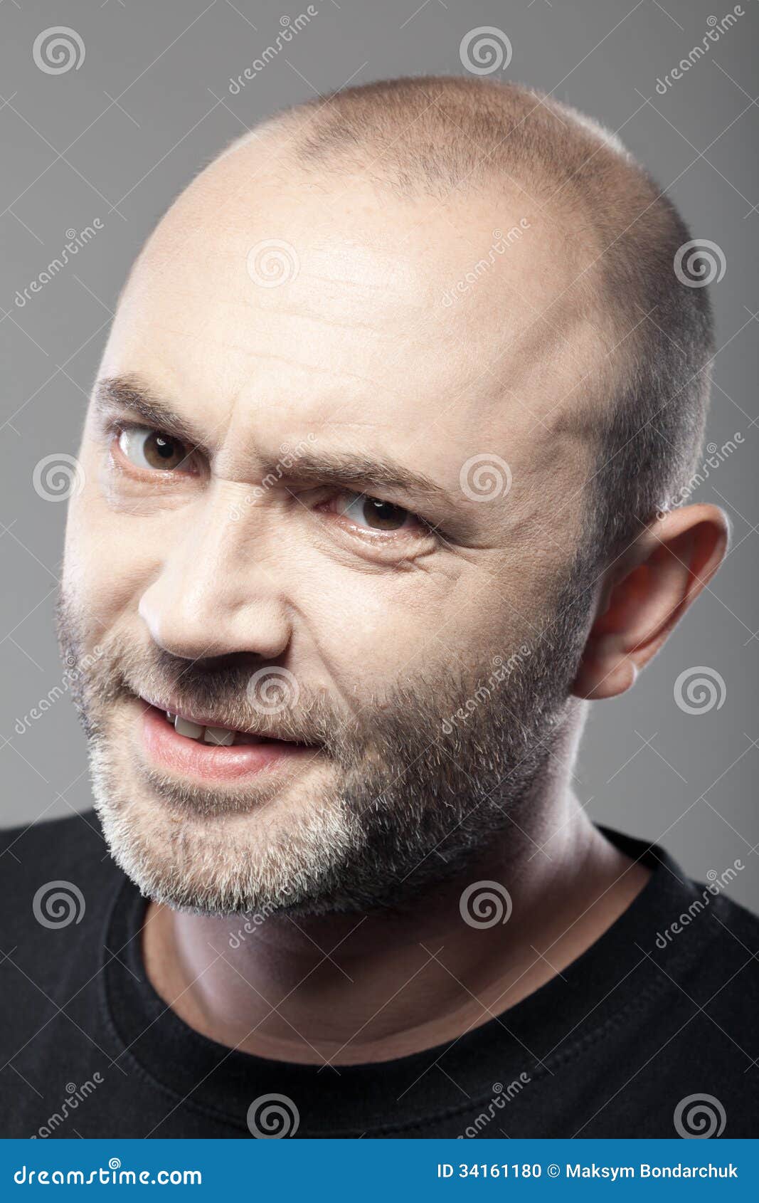 Portrait of Skeptical Looking Man Isolated on Gray Stock Photo - Image ...