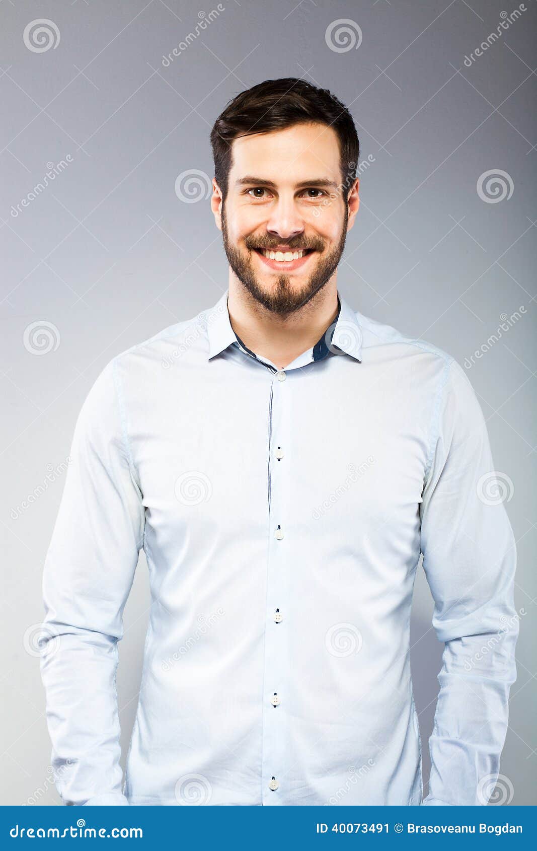 Portrait of a Smart Serious Young Man Standing Stock Image - Image of ...