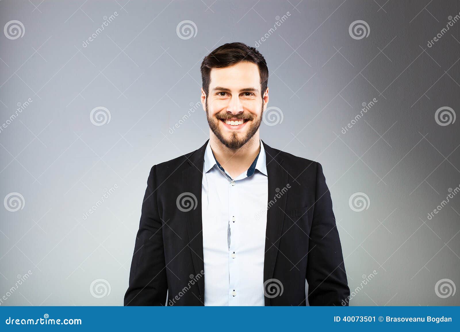 Portrait of a Smart Serious Young Man Standing Stock Image - Image of ...