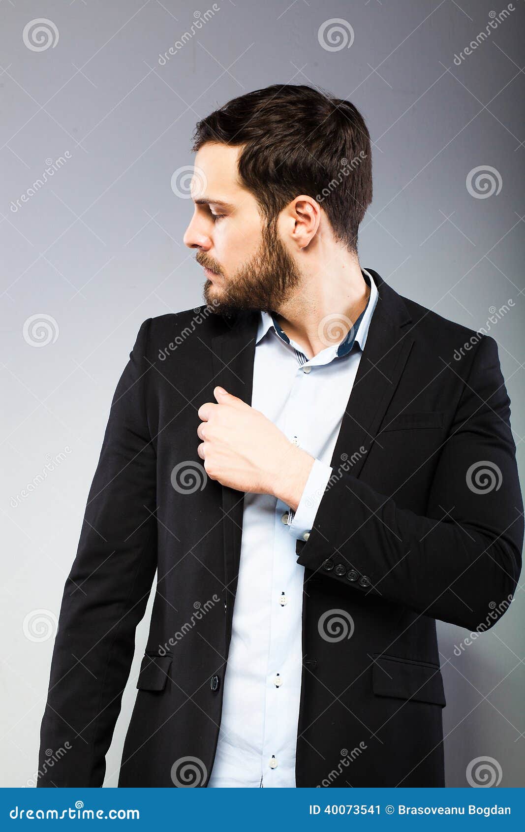 Portrait of a Smart Serious Young Man Standing Stock Image - Image of ...
