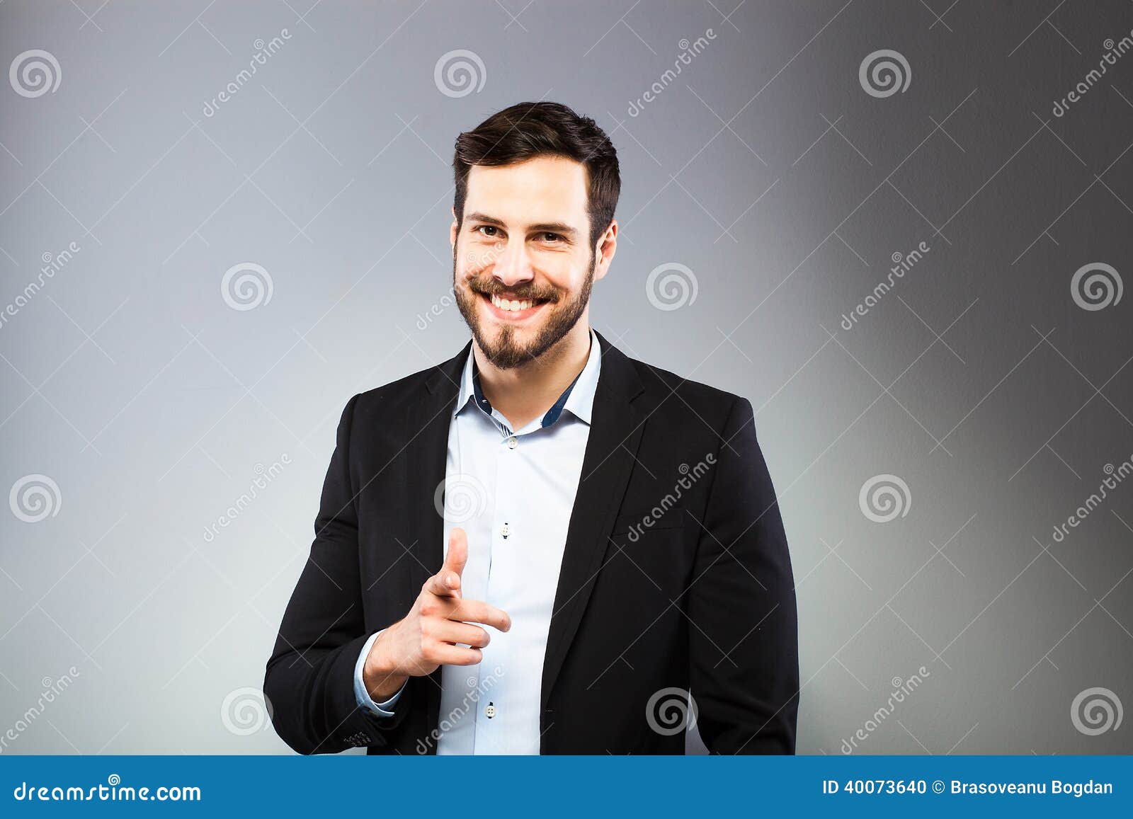Portrait of a Smart Serious Young Man Standing Stock Photo - Image of ...