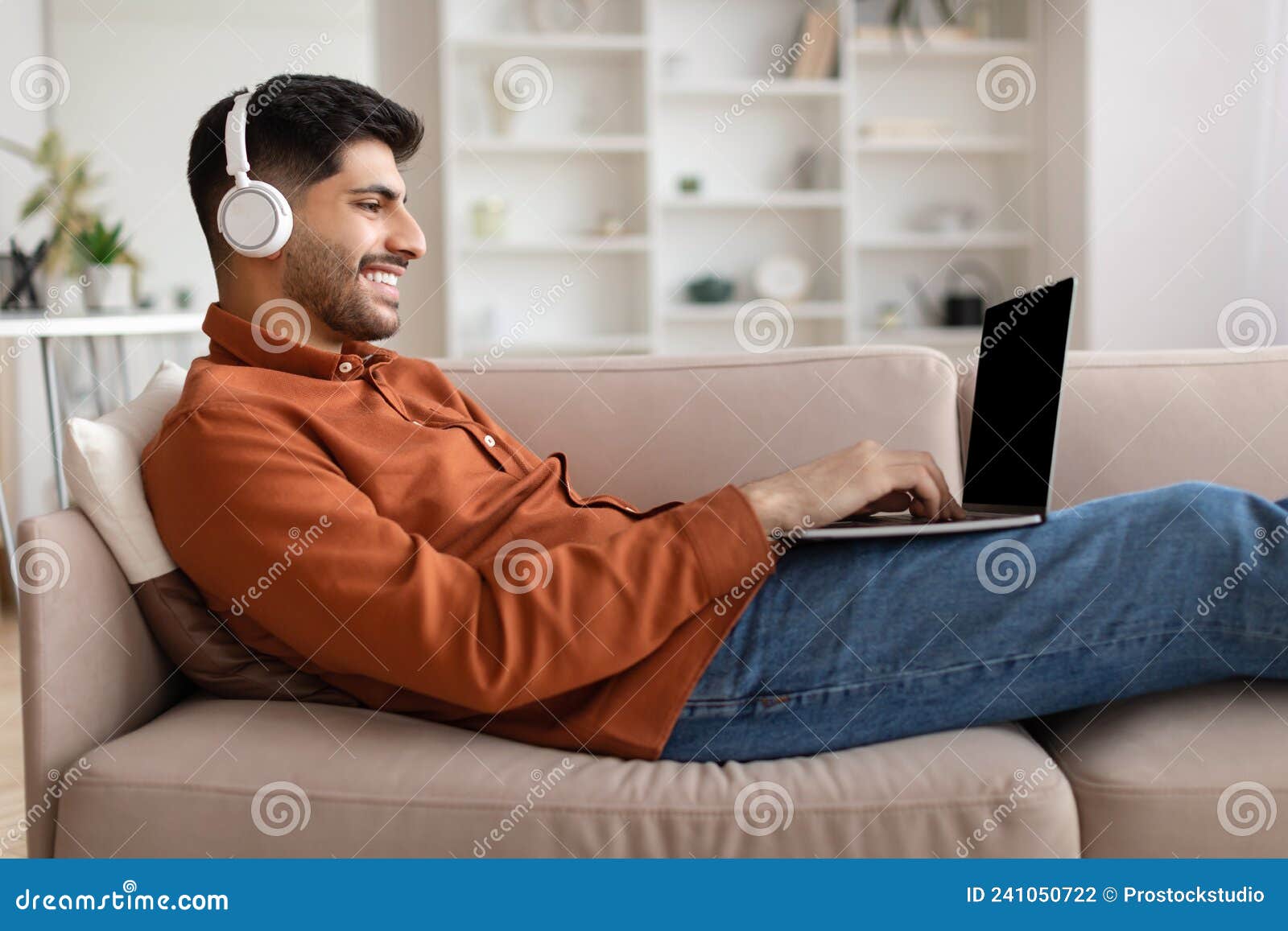 Portrait of Smiling Arab Man Using Pc at Home Stock Photo - Image of ...