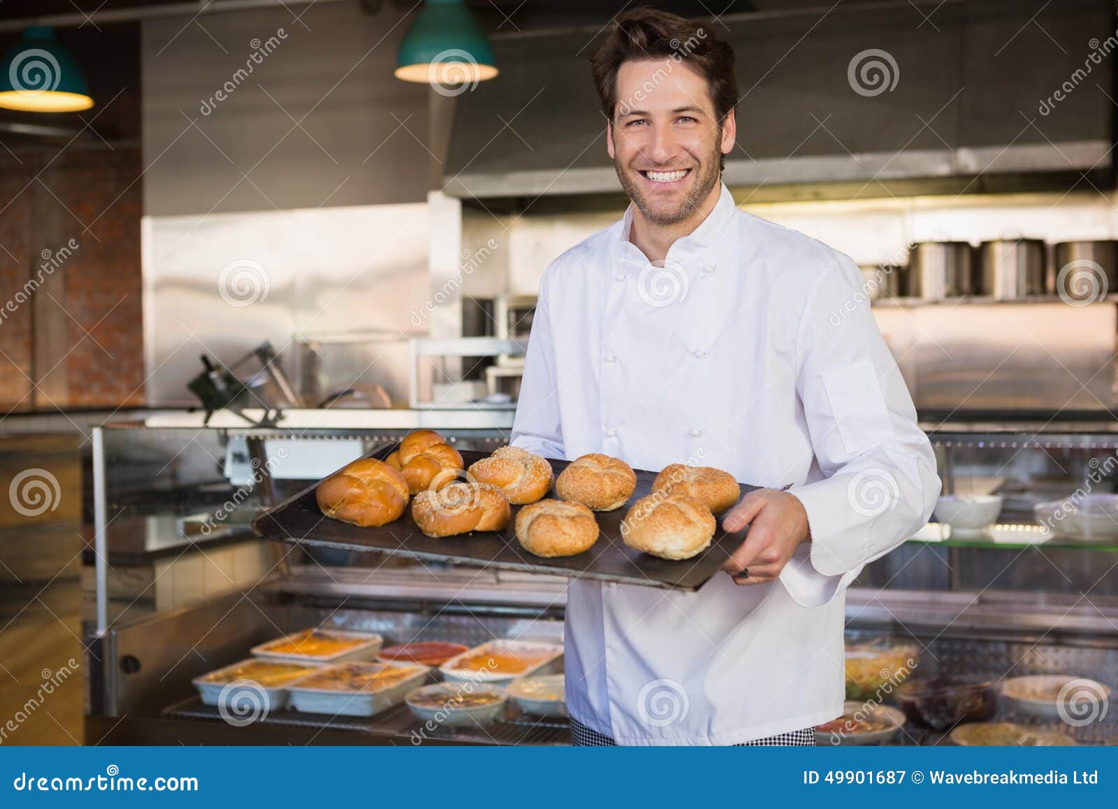 Portrait of Smiling Baker Holding Tray with Bread Stock Image - Image ...