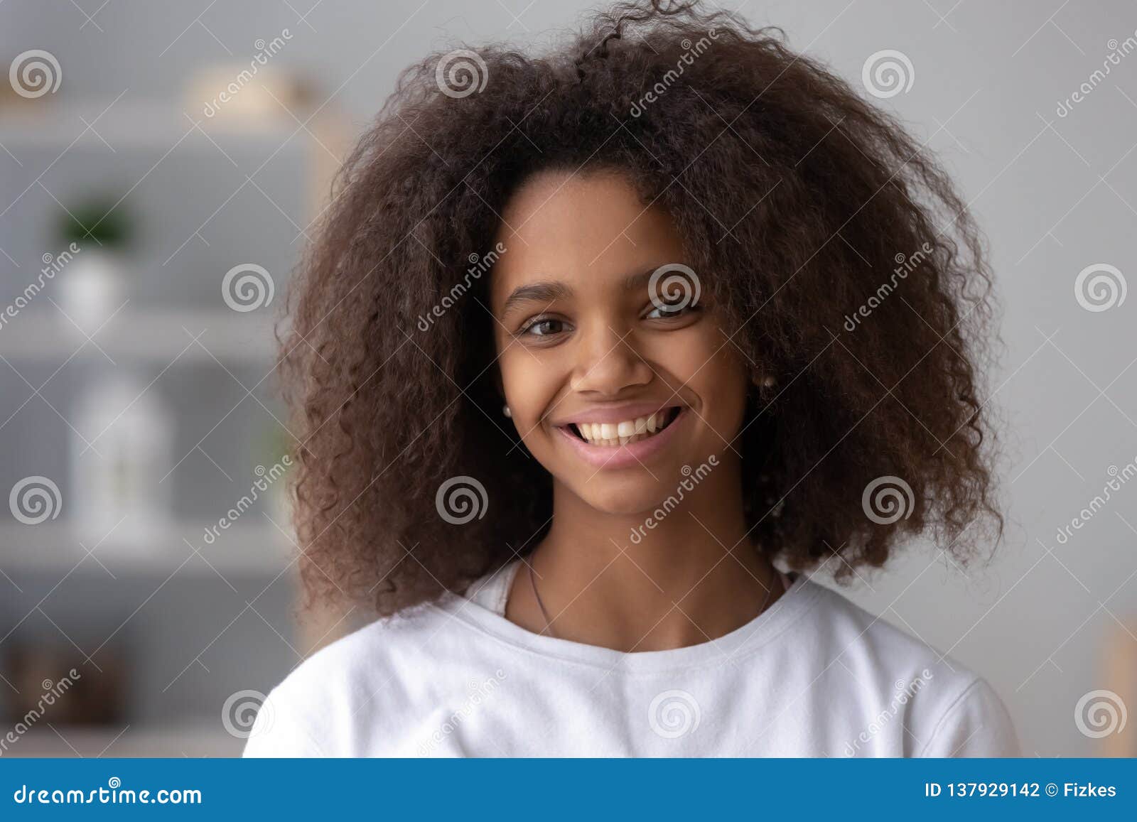 Portrait of Smiling Black Teenage Girl Posing at Home Stock Photo ... Portrait of Smiling Black Teenage Girl Posing at Home Stock Photo ...