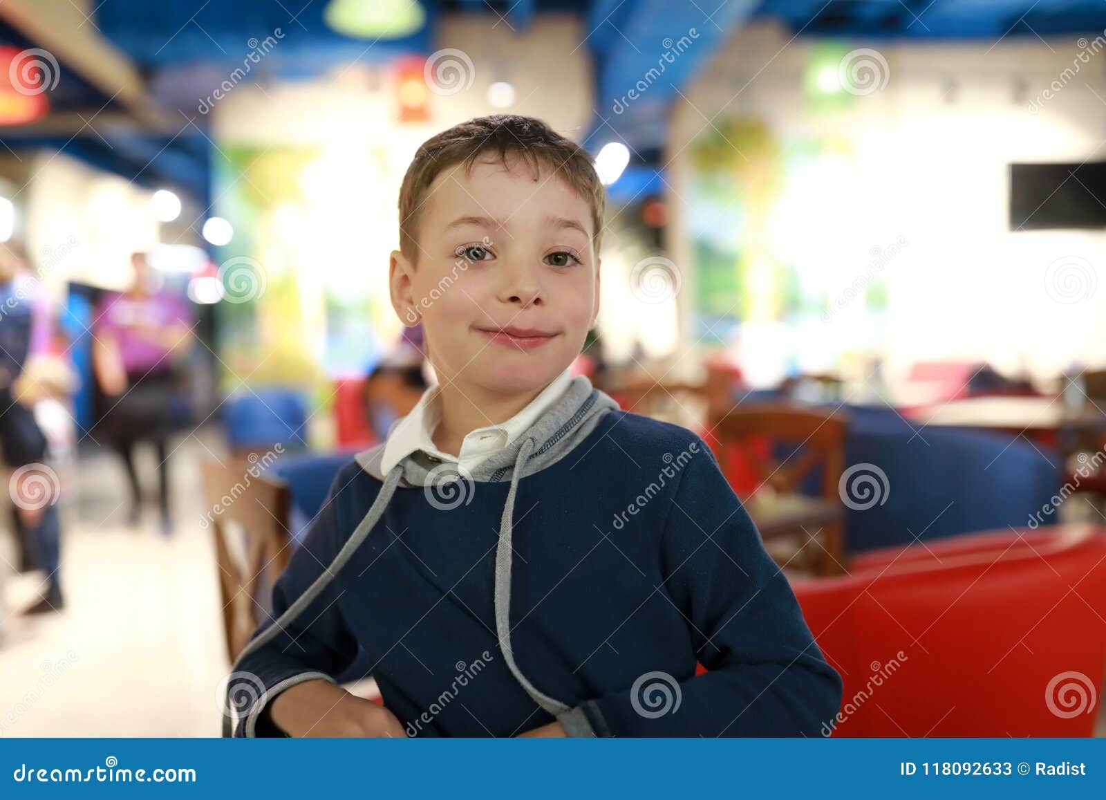 Smiling boy in cafe stock image. Image of cheerful, eating - 118092633