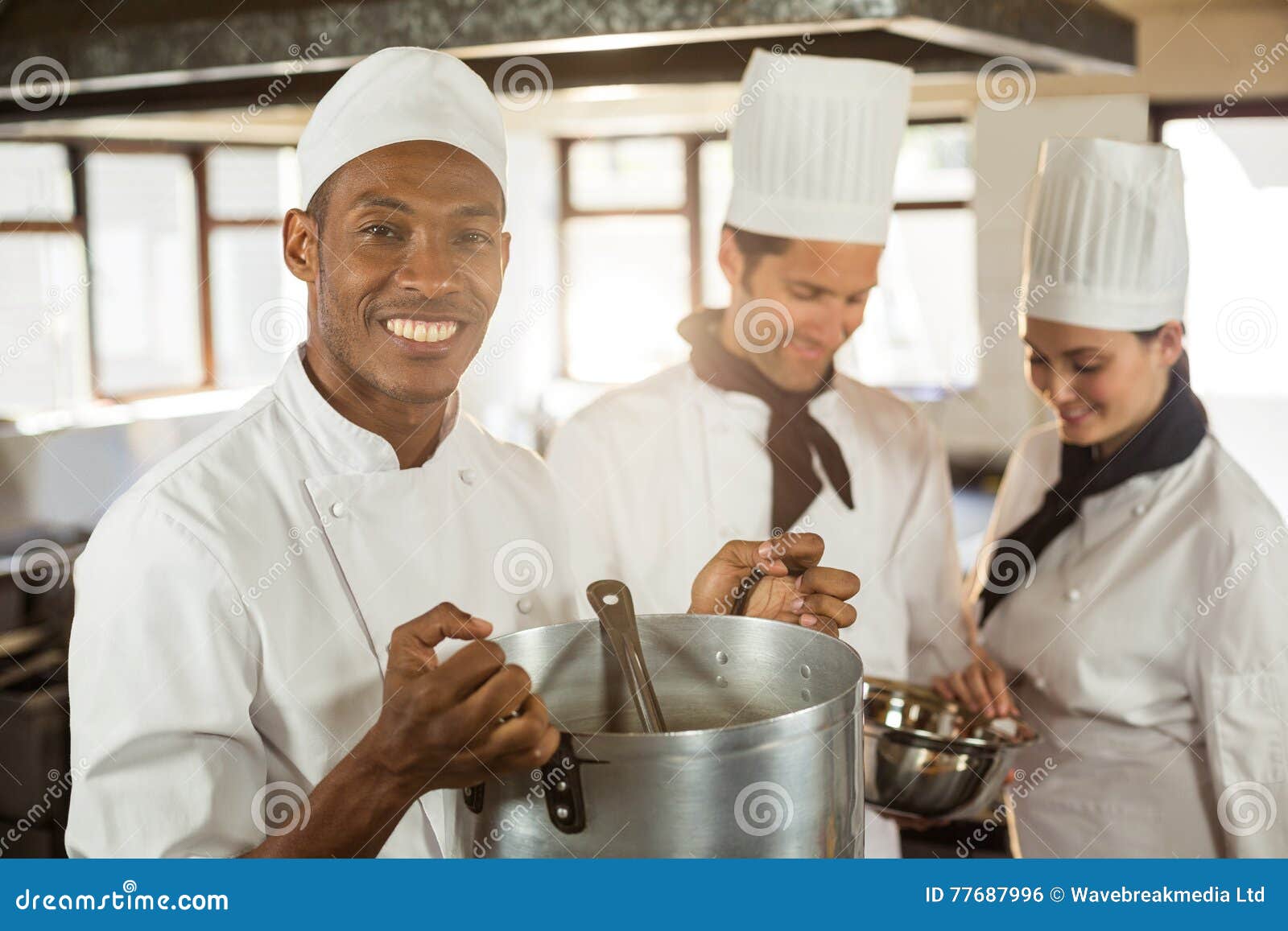 Portrait of Smiling Chef Holding a Cooking Pot Stock Photo - Image of ...