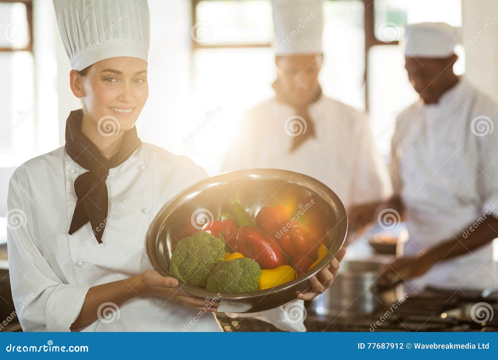Portrait of Smiling Chef Showing Bowl of Vegetable Stock Photo - Image ...