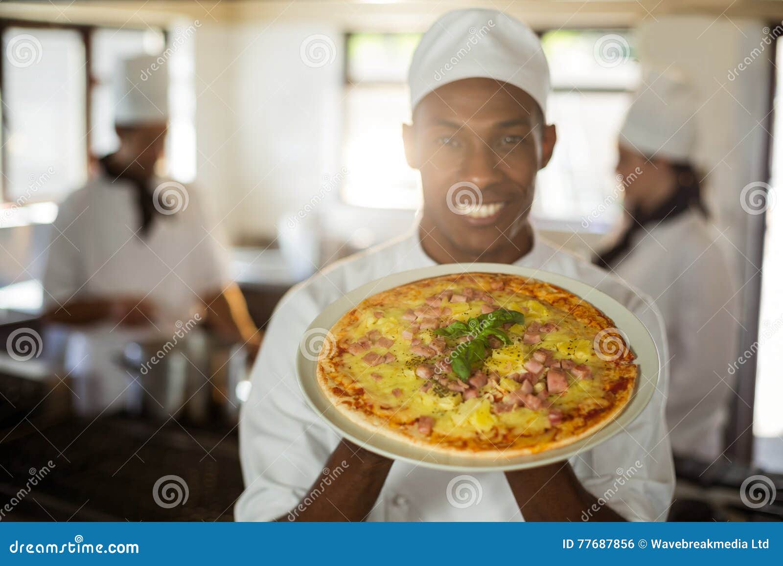Portrait of Smiling Chef Showing Pizza Stock Photo - Image of male ...