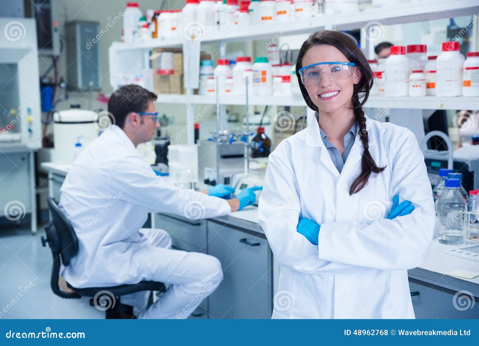 Portrait of a Smiling Chemist with Arms Crossed Stock Photo - Image of ...