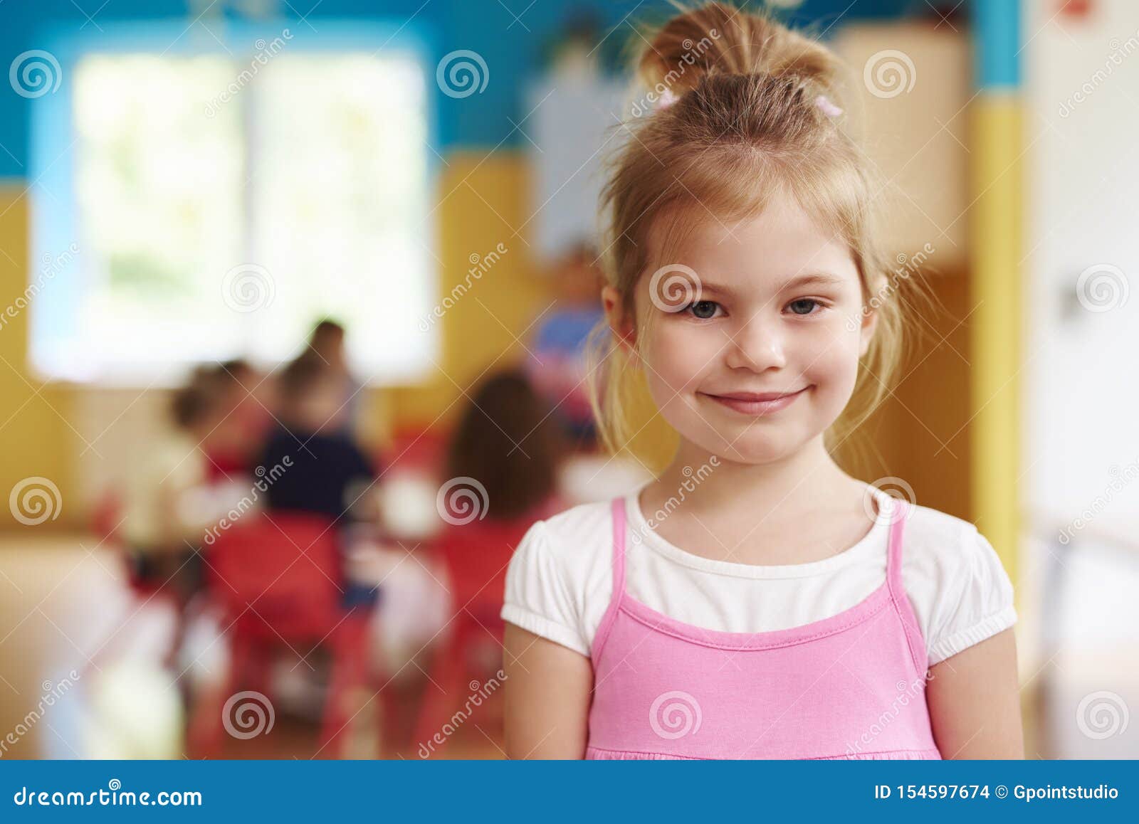 Portrait of smiling child stock photo. Image of classroom - 154597674