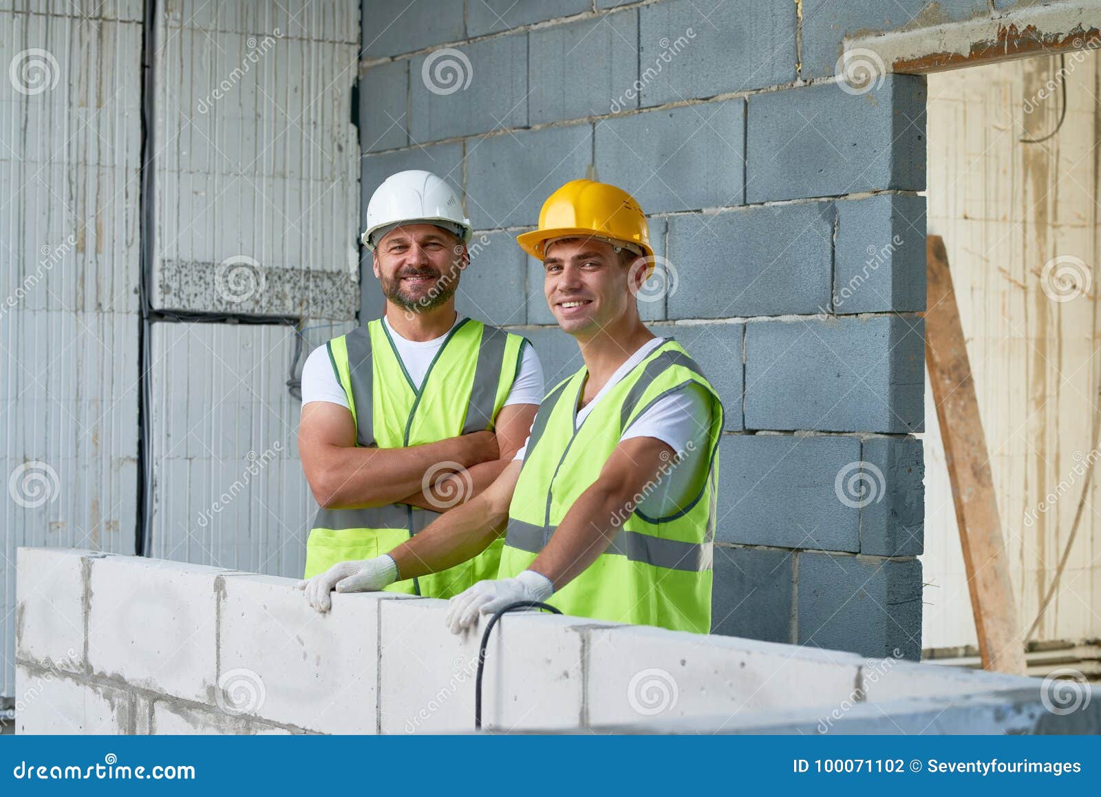 Portrait of Smiling Construction Workers Stock Photo - Image of builder ...