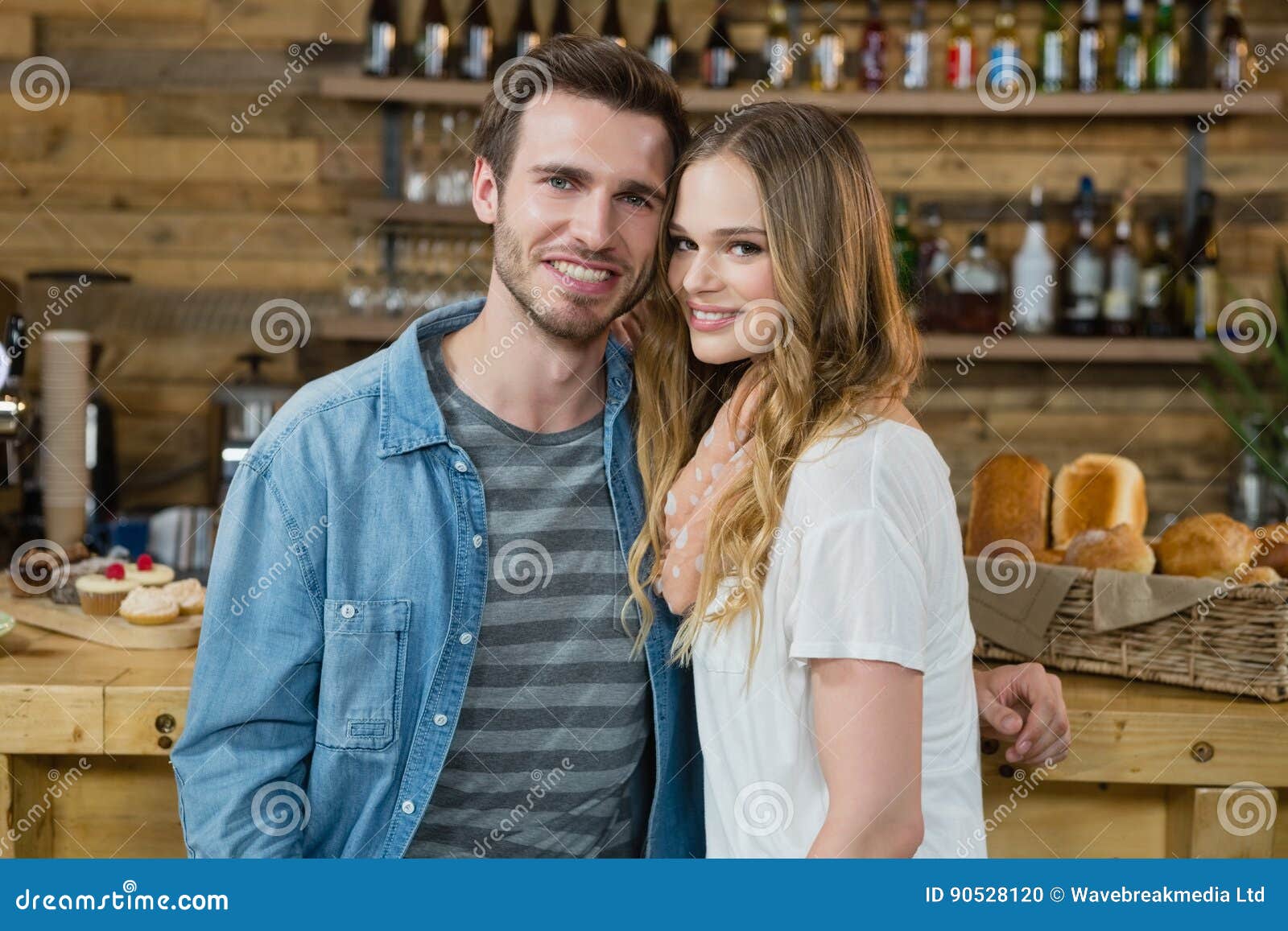 Portrait of Smiling Couple Standing Behind the Counter Stock Photo ...